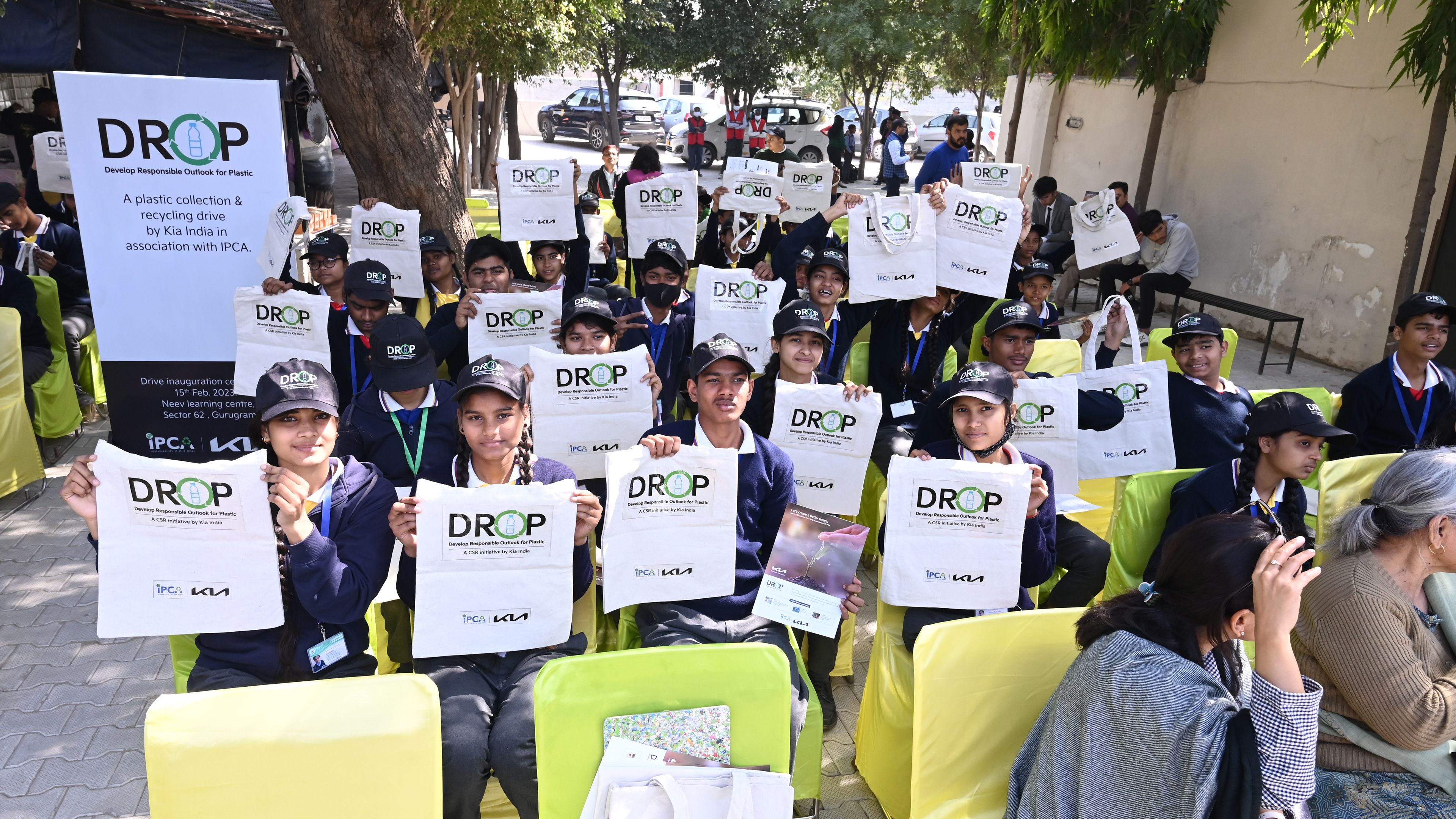Front view of a white Kia Seltos SUV parked on a driveway